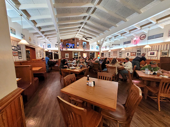 Wooden booths, warm lighting, and the buzz of satisfied diners – the dining room symphony that plays nightly at The Great 611.