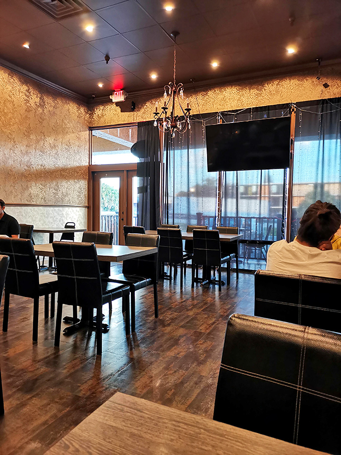 The dining room balances elegance with approachability – much like the cuisine itself. Those wooden floors have witnessed countless food epiphanies.