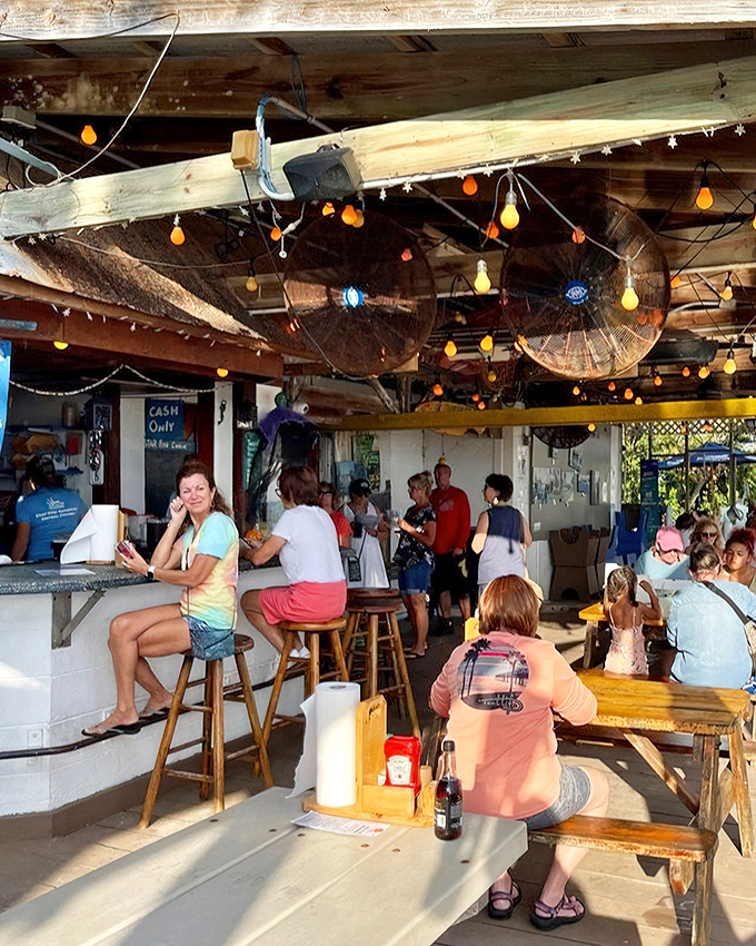 String lights, fishing nets, and the constant hum of happy diners. This isn't atmosphere you can manufacture—it's authentically earned.