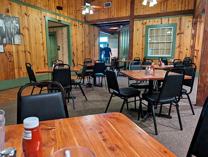 The dining room whispers "come as you are" with its unpretentious wooden tables and chairs—Texas hospitality in architectural form.