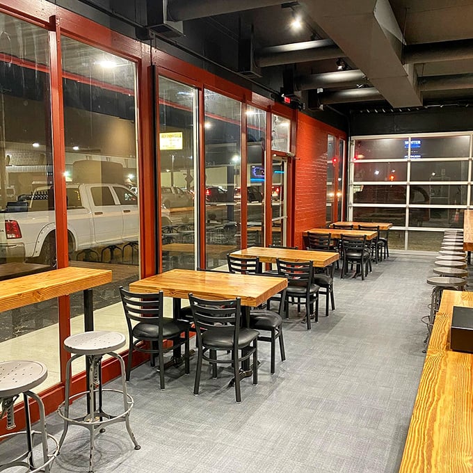 Industrial chic meets barbecue bliss in a dining room where the ductwork is exposed and pretensions are nowhere.