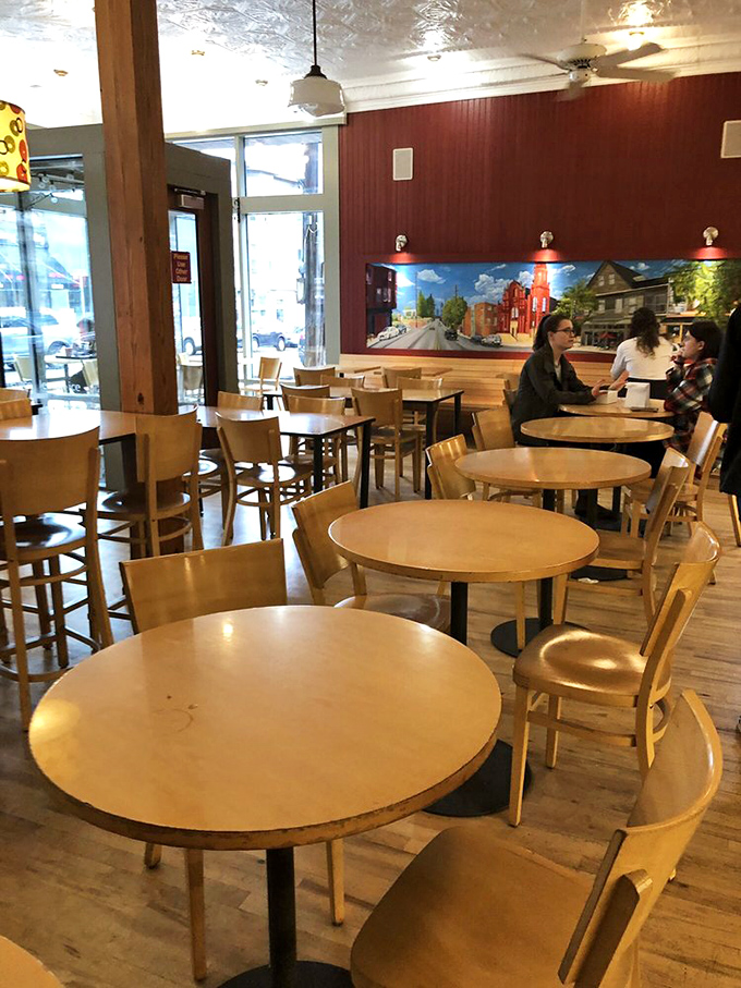 The warm interior invites lingering conversations over coffee and cannoli, just like your favorite Italian movie scene.