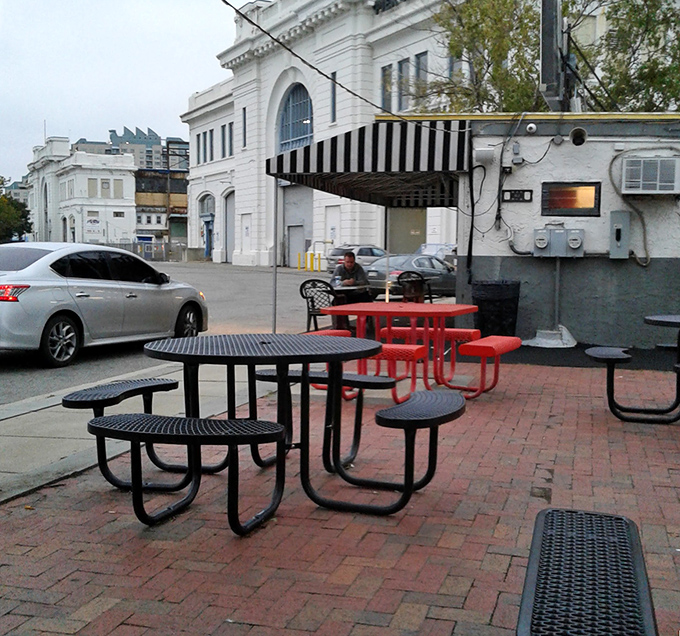 The dining patio—where sandwiches taste even better with a side of fresh air and people-watching opportunities.