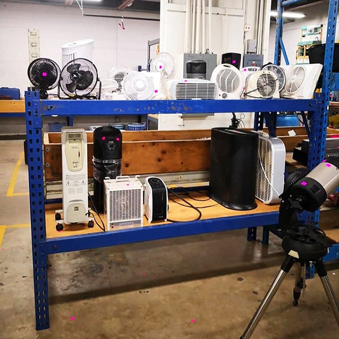 The fan section—where summer salvation comes cheap and nobody judges you for buying a backup for your backup.