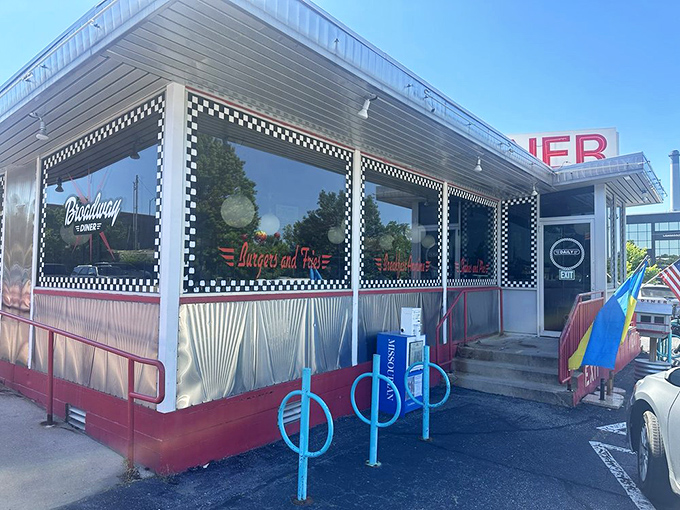Those checkered window frames aren't just decoration—they're a promise that inside this diner, everything is done the proper, traditional way.