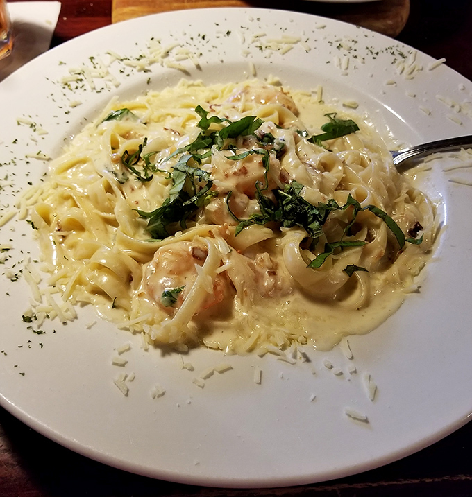 Fettuccine that would make an Italian grandmother nod in approval. That cream sauce is practically illegal in twelve states.