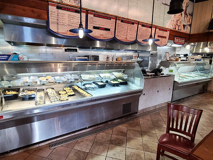 The seafood display case—where dreams begin, decisions get difficult, and your dinner makes eye contact with you.