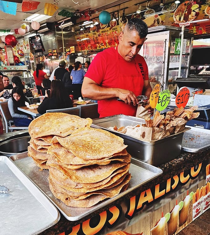 Handmade tortillas stacked higher than my weekend reading pile. The foundation of any proper Mexican feast begins here.
