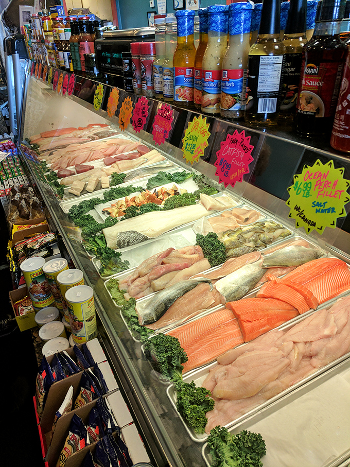 Fresh catch displayed with pride. This seafood case is the aquatic equivalent of a jewelry store—treasures under glass, just waiting to be claimed.