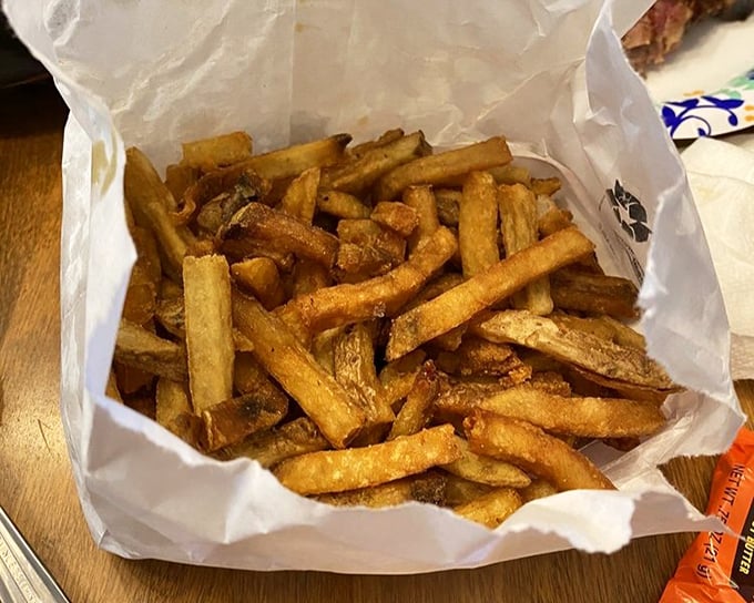 Hand-cut fries that actually taste like potatoes—what a concept! These golden beauties deserve their own fan club and commemorative t-shirt.