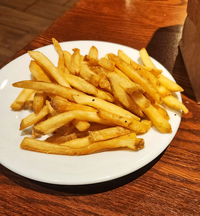 Golden fries that have achieved that perfect balance between crisp exterior and fluffy interior—the Zen masters of the side dish world.