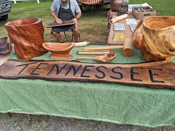 "TENNESSEE" carved in wood by artisans who transform fallen trees into conversation pieces that scream "I vacationed in the Volunteer State!"