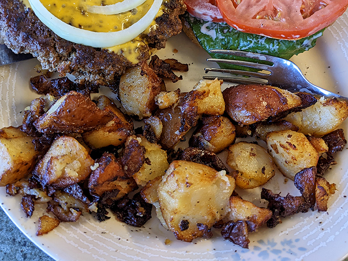 Home fries with personality—crispy edges, tender centers, and just enough seasoning to make you forget vegetables exist elsewhere on the menu.