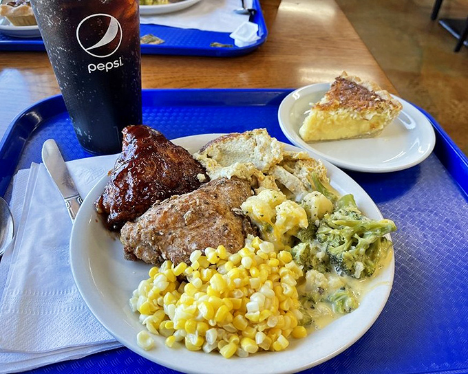 A plate that tells the Midwest story—meatloaf, mashed potatoes, and vegetables that remember what sunshine feels like.
