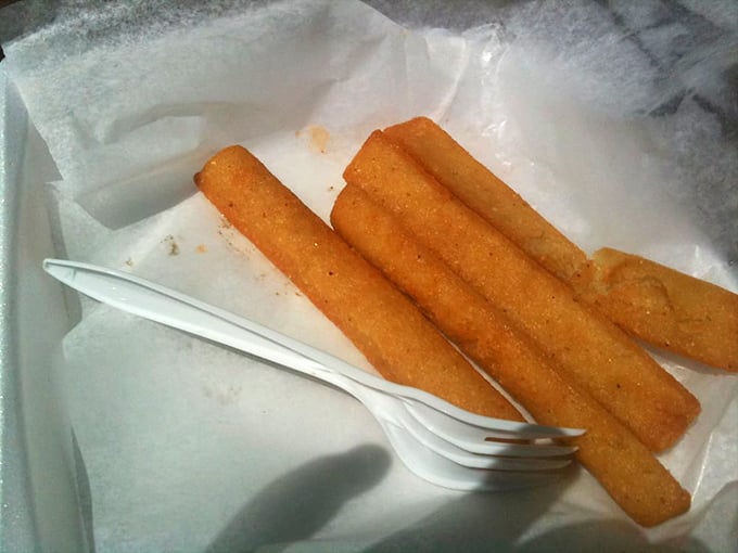 The hush puppy sticks at B’s are like the opening act that threatens to steal the show—crispy, golden, and impossible to stop eating.