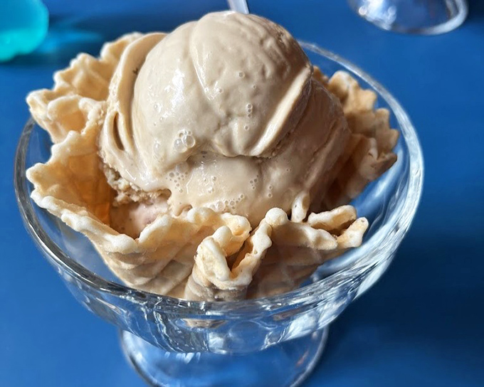 Ice cream nestled in a homemade waffle bowl—proof that the best things in life come in edible containers.