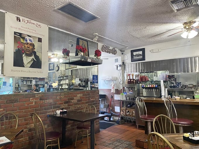 No Instagram filters needed—just brick walls, worn-in comfort, and the promise of approaching food that requires a strategy to consume.