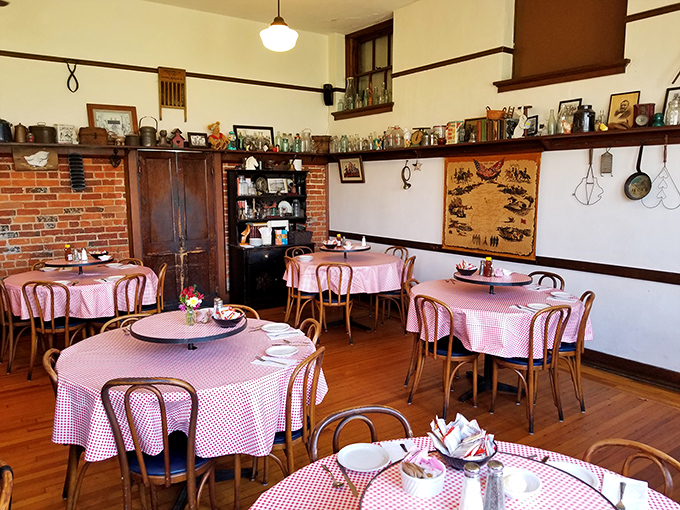 Brick walls, vintage shelves, and those iconic bentwood chairs—this dining room has graduated from education to culinary celebration.