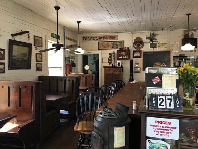 Every vintage sign and weathered wood panel tells a story. That potbelly stove isn't decoration—it's a cast iron historian keeping watch.