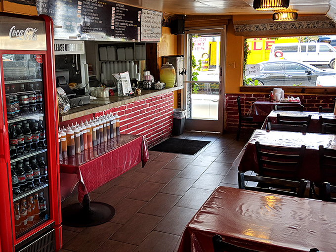 The ordering counter beckons with its sauces lined up like soldiers ready for duty. Choose your weapon—or let the meat shine on its own.