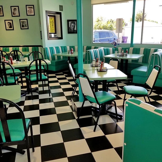 Not all heroes wear capes—some wear turquoise booths and black-and-white floors. The diner's interior is like a hug from your favorite decade.