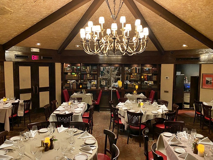 Chandeliers, white tablecloths, and Tudor-inspired beams create an atmosphere where even Henry VIII would feel right at home—though with better table manners.