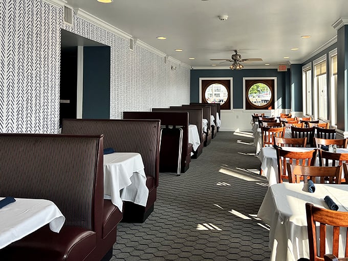 Nautical blues, crisp white linens, and those magical porthole windows—dining rooms don't get more "Chesapeake chic" than this waterfront haven.