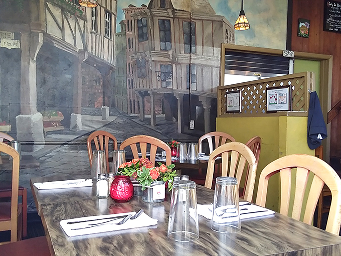 The mural transports diners to a European streetscape, proving that sometimes the best French experience in Portland doesn't require a passport.