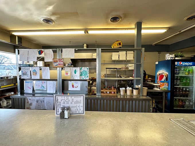 The kitchen at George's isn't designed for show – it's a workshop where flavor is the only language that matters.