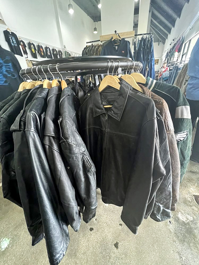 Leather jacket heaven—where motorcycle dreams and budget realities happily coexist. Each one aged to perfection, like a fine wine but wearable and significantly cooler.