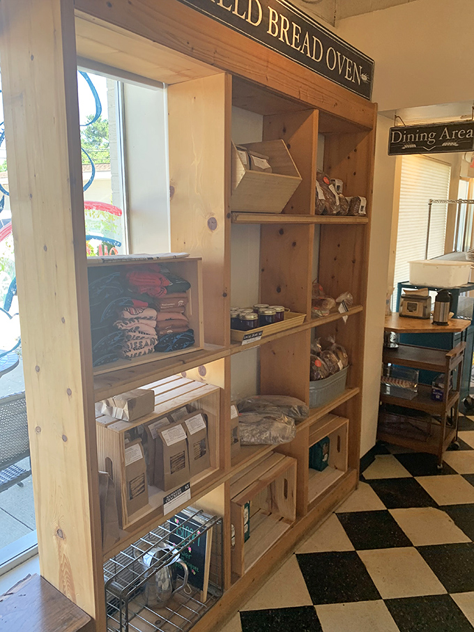 The shelves tell a story of craftsmanship and care. This isn't just a retail space—it's where bread lovers come to worship at the altar of grain.