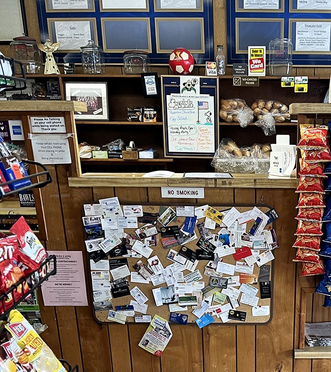 The counter at Earl's—where business cards accumulate, chips dangle temptingly, and sandwich dreams come true daily.