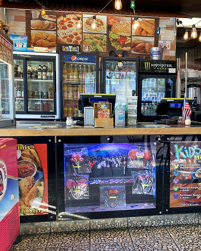 Where the magic happens. The ordering counter showcases colorful menu boards and cold beverages waiting to complement your meal.