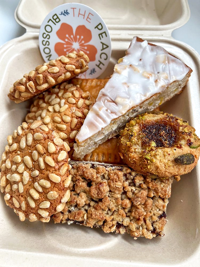 A pastry box from Peach Blossom isn't just breakfast – it's edible art therapy that makes Monday mornings significantly less offensive to humanity.