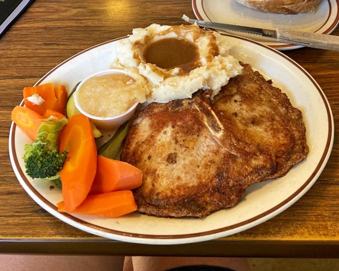 These pork chops aren't just breakfast—they're a commitment to excellence, served with vegetables that didn't come from a freezer bag. Grandma would approve.