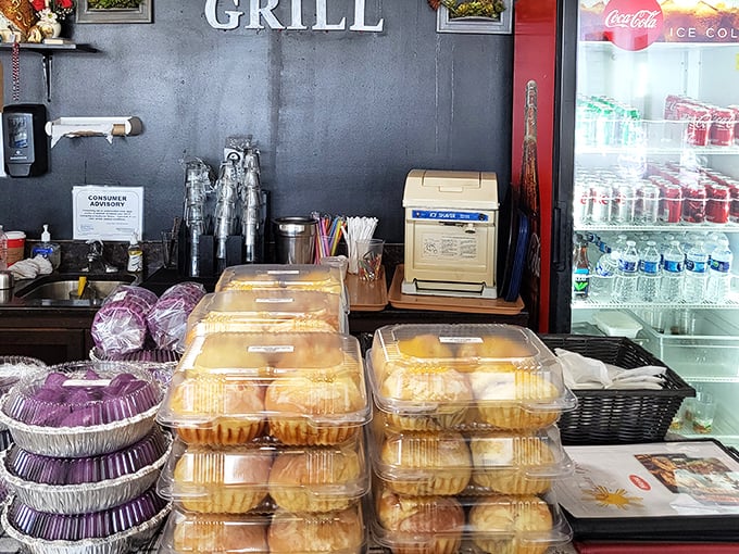 The display case—where Filipino pastries and cold drinks wait patiently for their moment to complement your savory feast.