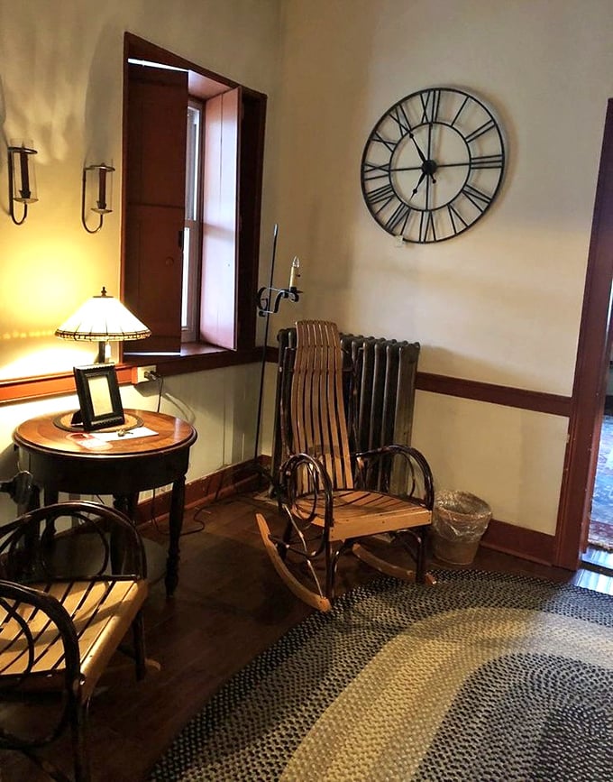 A rocking chair waiting patiently by warm lamplight. The perfect spot to contemplate life's big questions—like what to order for dessert.