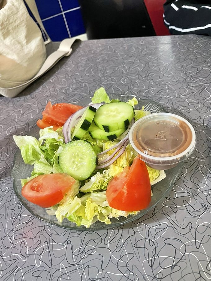 Even the salad gets the respect it deserves—crisp, fresh, and colorful, proving diners can do healthy without sacrificing satisfaction.