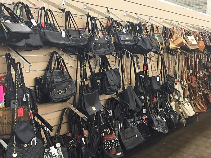 Handbag heaven stretches as far as the eye can see. Designer dreams and practical carryalls hanging in suspended animation, waiting for their next shoulder.