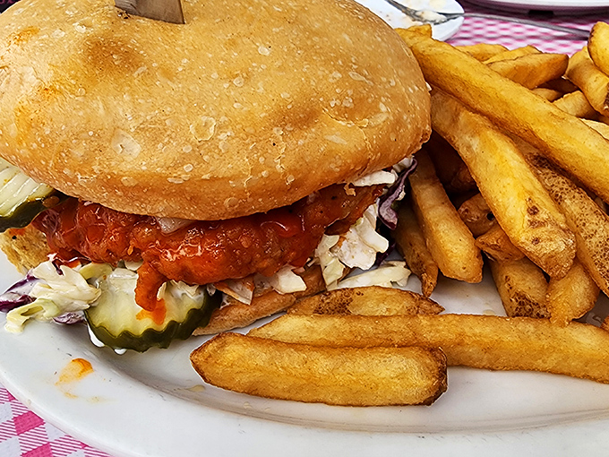 This isn't just a sandwich—it's a glorious mess requiring strategic eating, multiple napkins, and zero regrets about the shirt you're wearing.