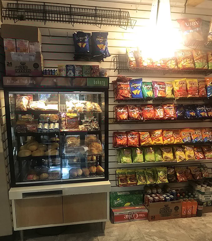 Carb heaven meets snack nirvana. This display proves that shopping stamina requires proper fueling—preferably with something wrapped in cellophane.