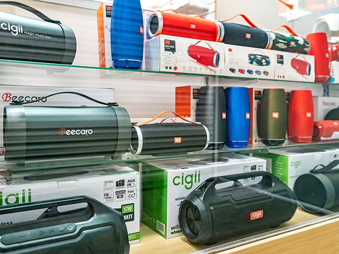 Portable speakers in every color and size imaginable—because nothing says "I respect my neighbors" like bringing your own soundtrack to the beach.