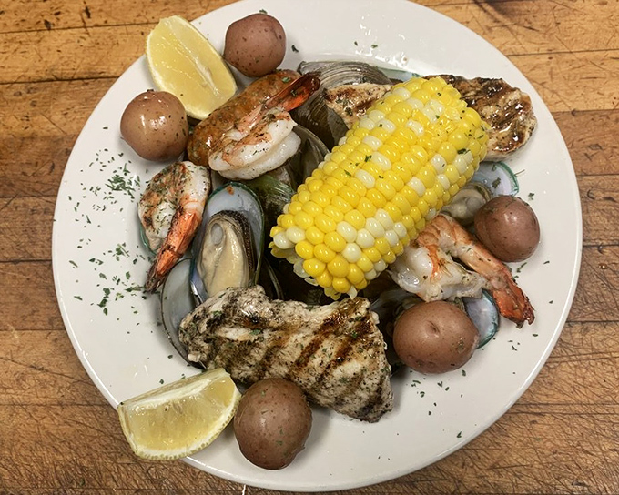 A seafood boil that's basically a treasure chest of the ocean – corn on the cob playing the role of golden doubloon among the briny jewels.