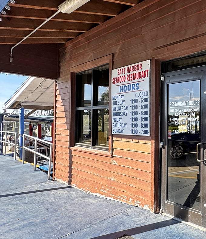 The hours posted like a friendly invitation – closed Mondays because even seafood needs a day off.