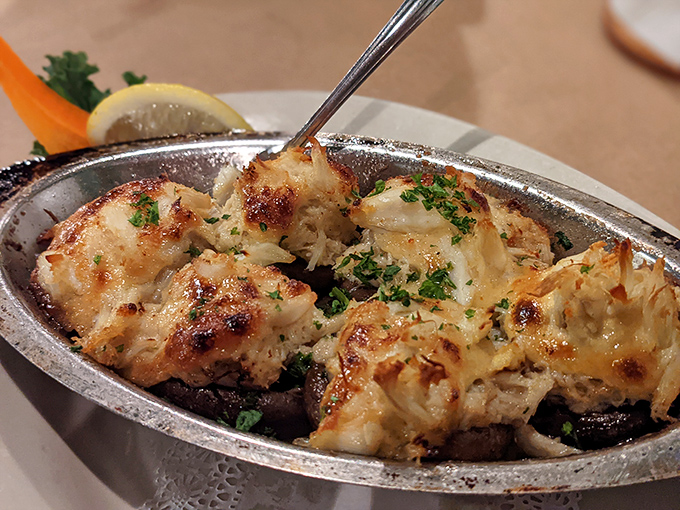These stuffed mushrooms aren't just appetizers; they're little boats of crabby goodness sailing across a sea of melted butter and herbs.