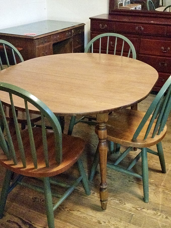 A dining set with character that whispers "Sunday family dinners" and "late-night heart-to-hearts"—the mint-green chairs adding a splash of personality no catalog furniture could match.
