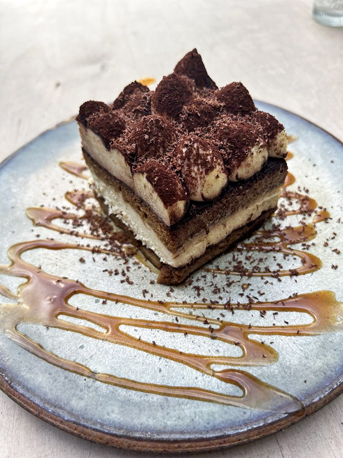 This tiramisu doesn't just end your meal—it throws a farewell party complete with layers of mascarpone, espresso, and chocolate confetti.