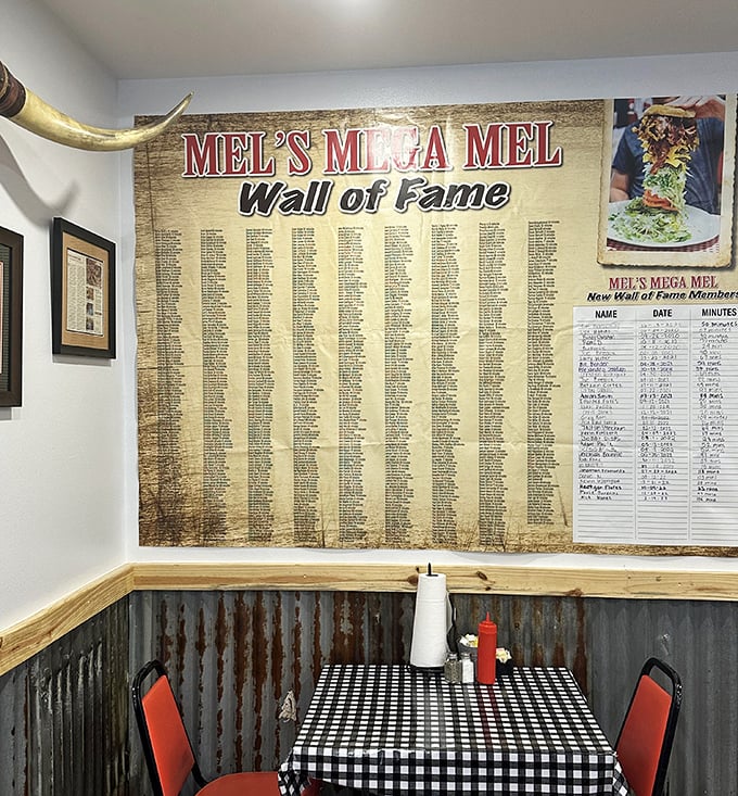 The Wall of Fame—where food warriors who conquered the Mega Mel are immortalized, their digestive heroism forever enshrined.