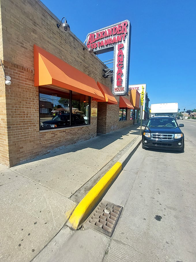 The sidewalk approach to Alexander's feels like the yellow brick road of breakfast—each step bringing you closer to pancake nirvana.
