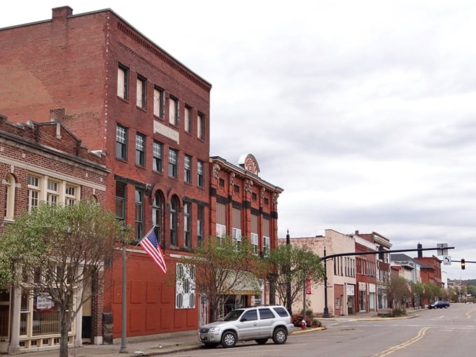 Coshocton's corner building proudly displays its 1891 heritage in stone. The detailed brickwork speaks to craftsmanship rarely seen today.